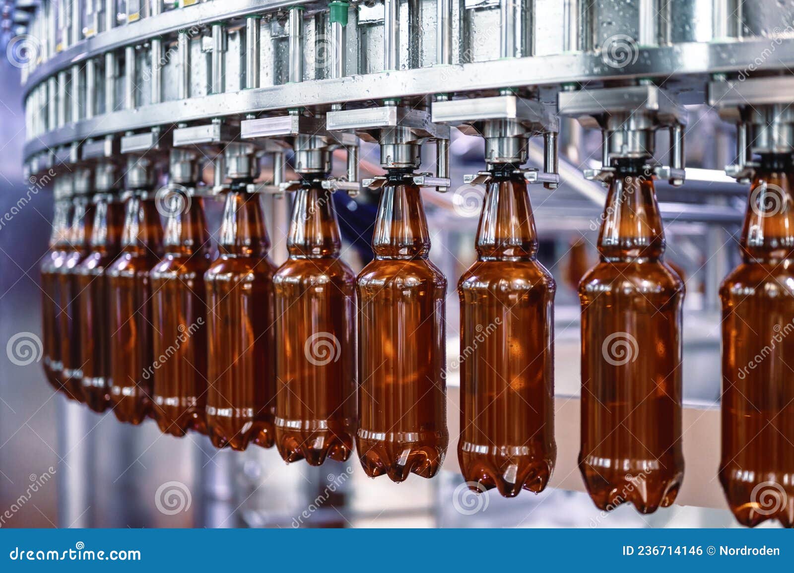 Large Filling Machine, the Process of Filling Plastic Bottles with ...