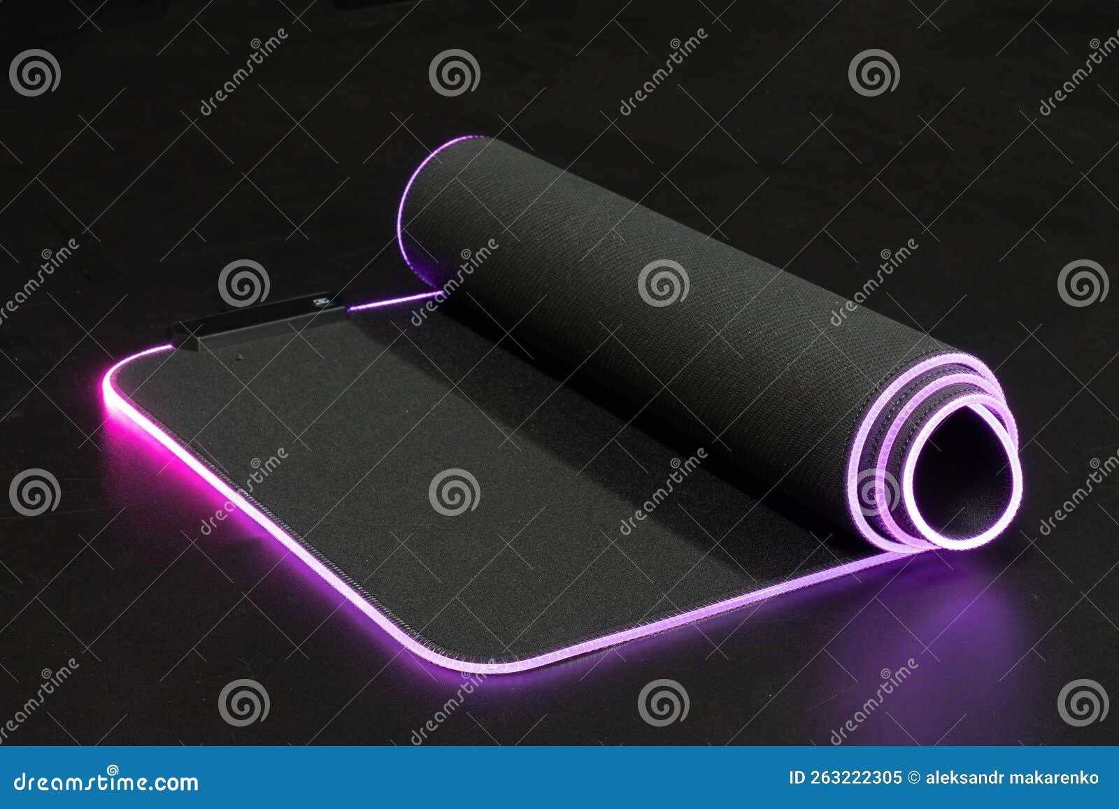 Large Flexible Backlit Mouse Pad on a Dark Background Stock Image ...