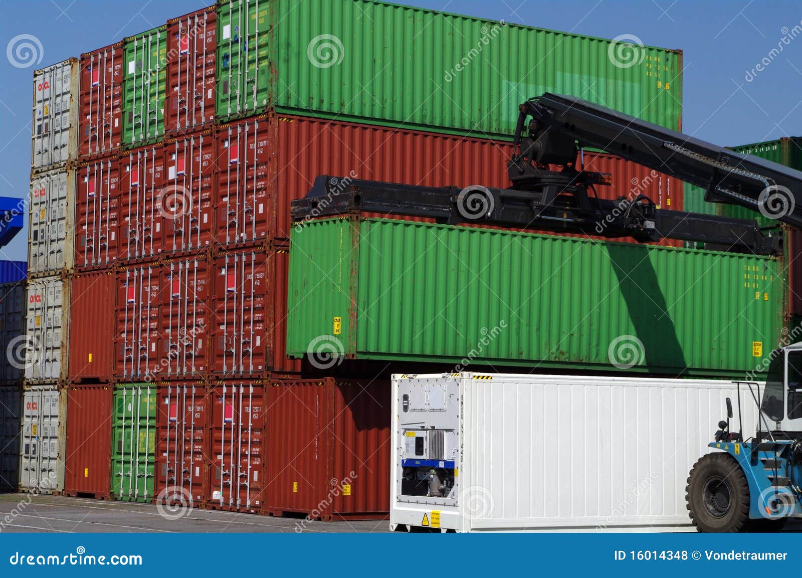 Large Forklift Stacking Containers in Port Stock Photo - Image of ...