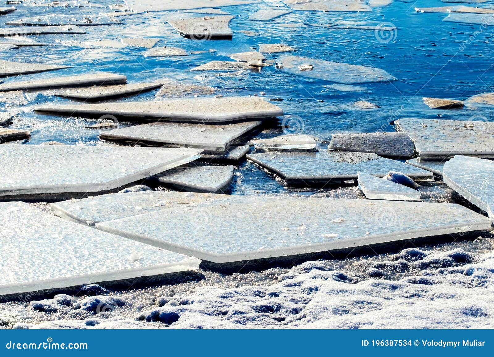 Large Fragments of Ice on the Shore River in Sunny Weather Stock Photo ...