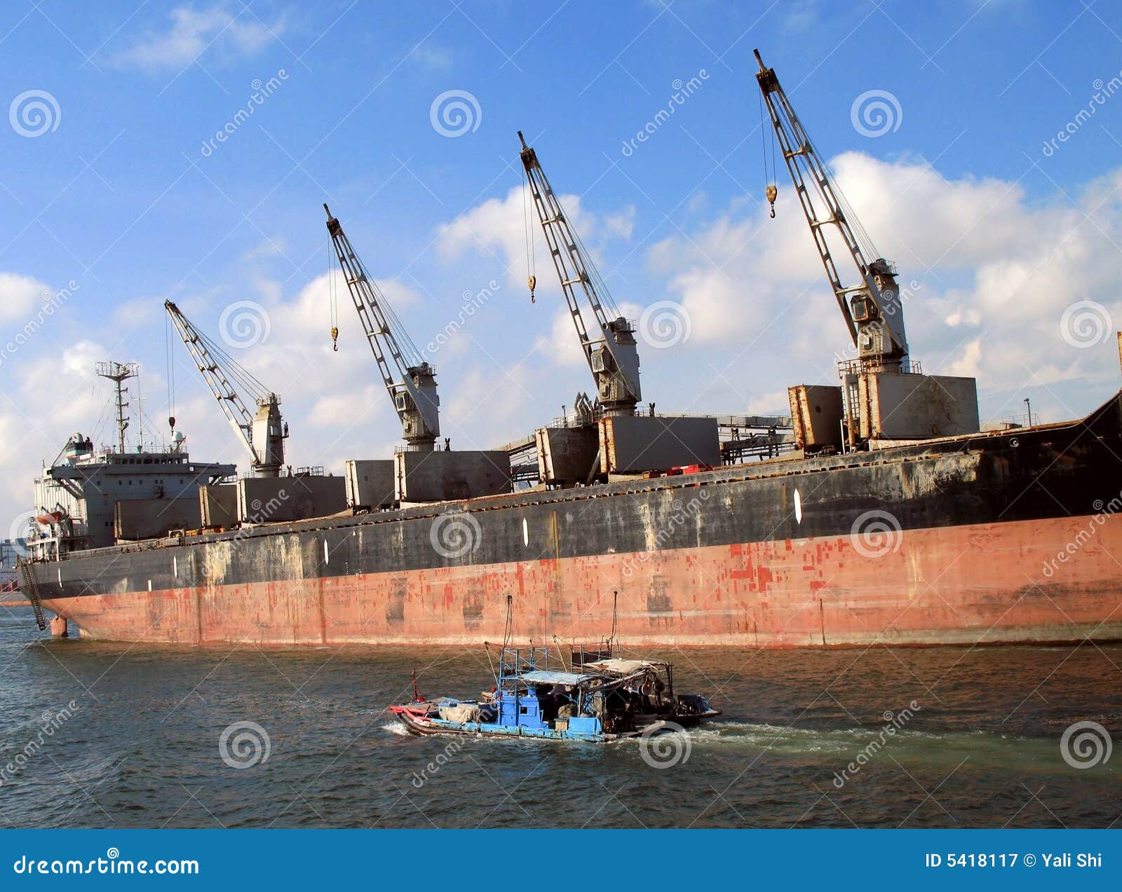 Large Freighter and Fishing Boat Stock Image - Image of harbor, cables ...