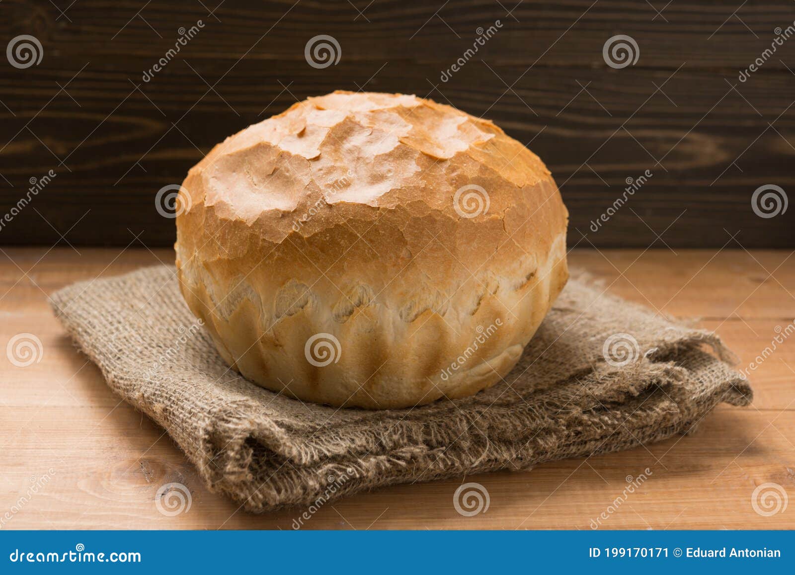 Large Fresh Bread Loaf on a Wooden Table, Rustic Style Stock Image ...