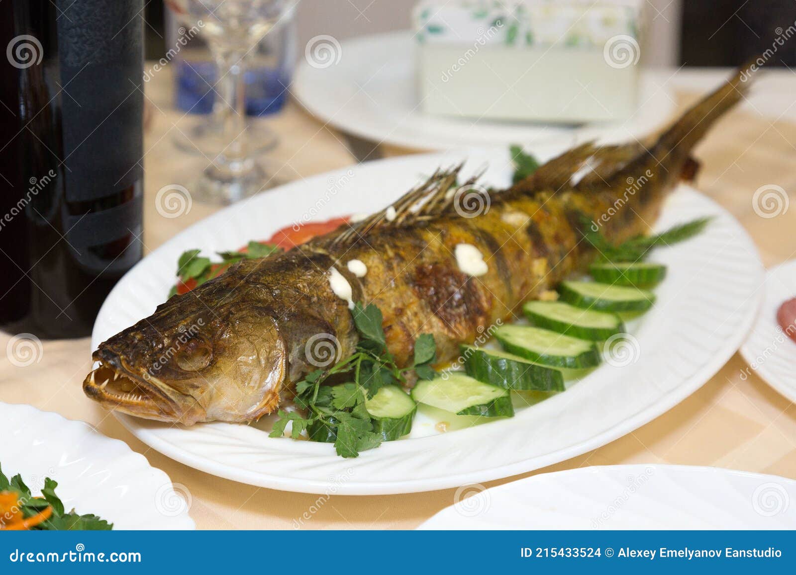 Large Fried Fish on a Platter with Vegetables Stock Photo - Image of ...