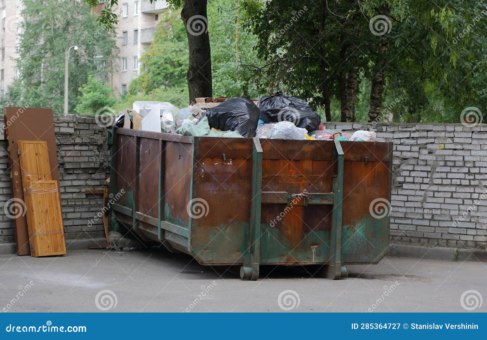 Large Garbage Container, Big Rusty Dumpster Full of Garbage Stock Image ...