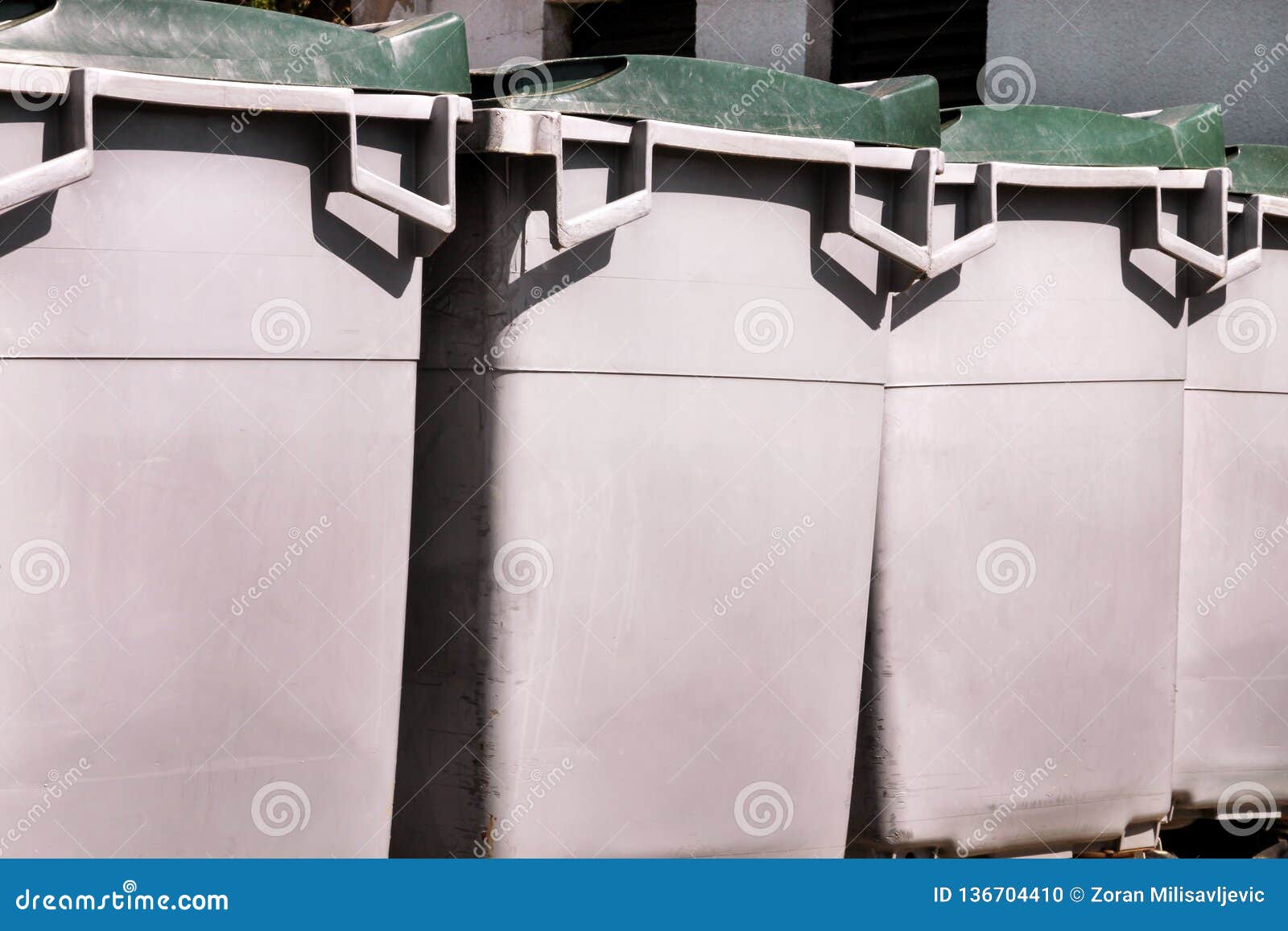 Large Garbage Containers, Trash Dumpsters and Bins Standing in Row ...