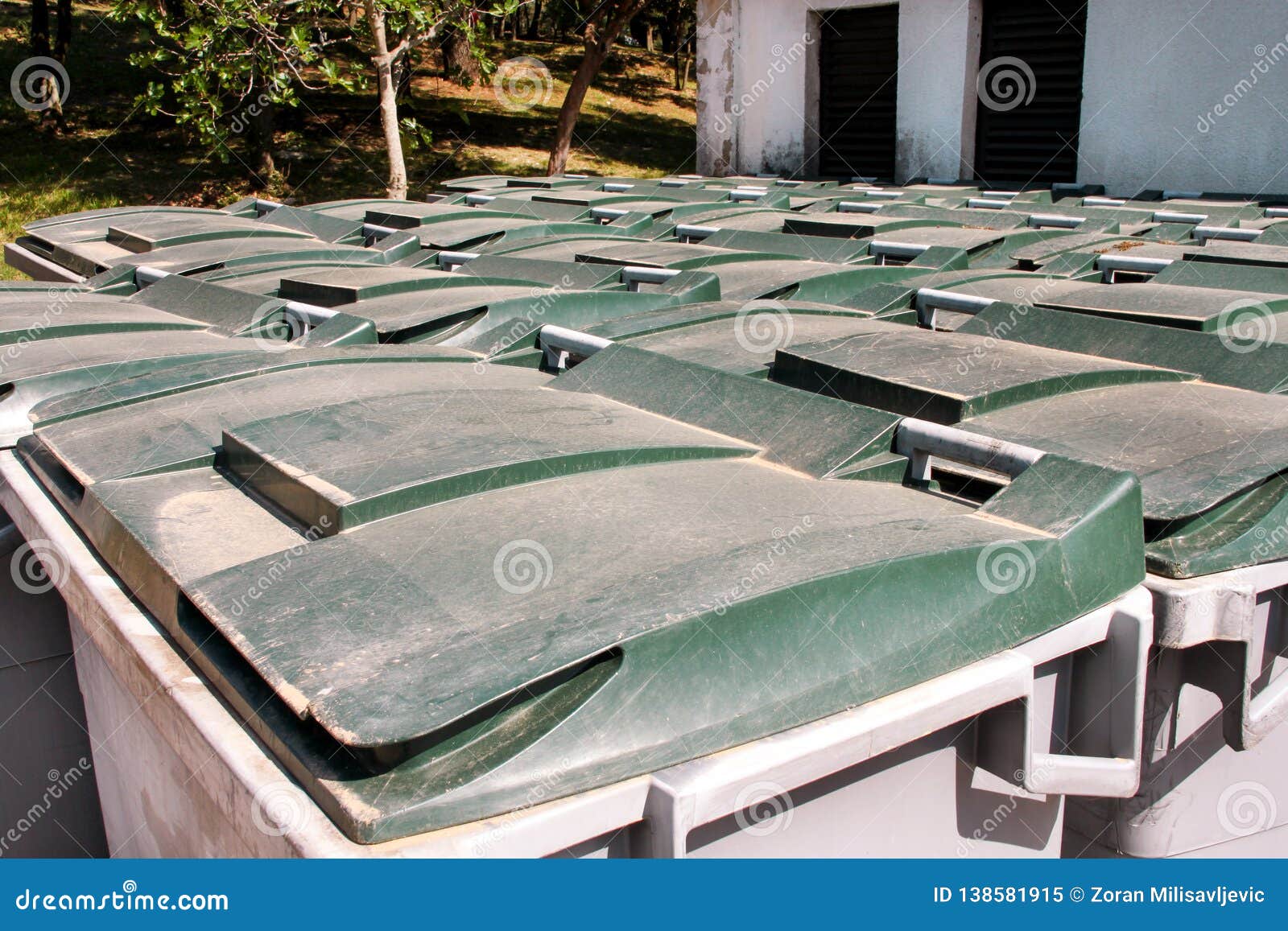 Large Garbage Containers, Trash Dumpsters and Bins Standing in Row ...