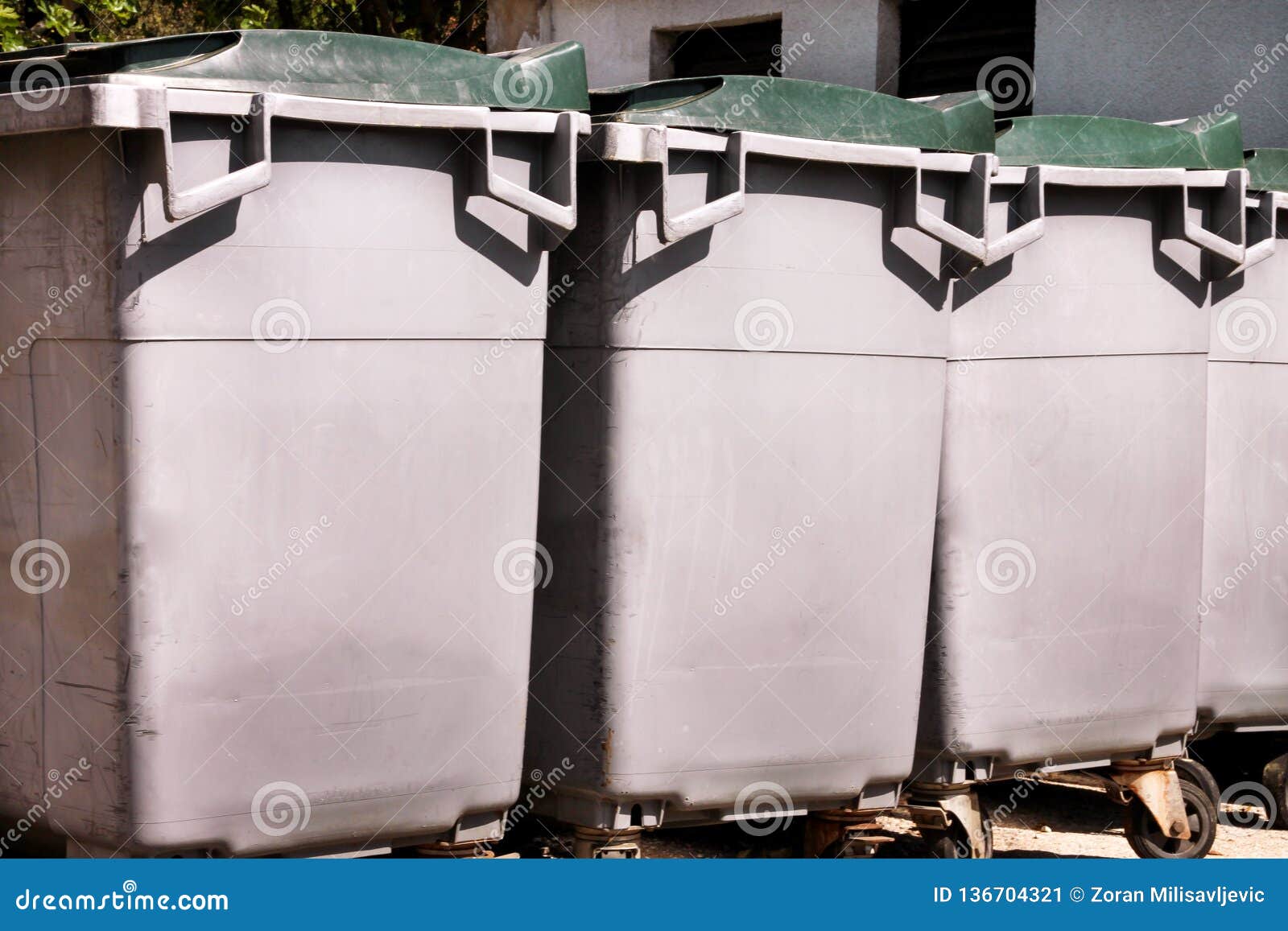 Large Garbage Containers, Trash Dumpsters and Bins Standing in Row ...