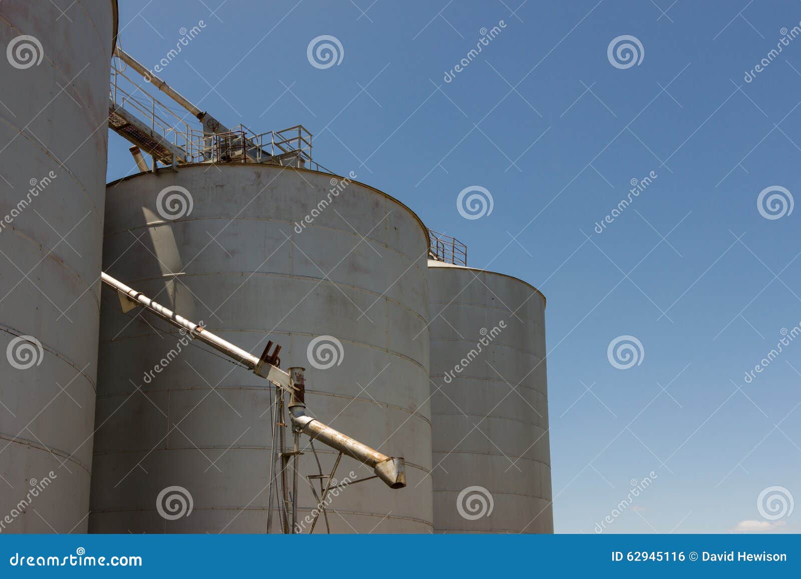 Large Grain Silos stock photo. Image of harvest, metal - 62945116