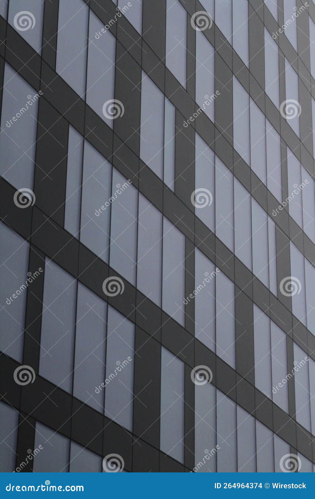 Large Gray Office Building with Black Glass Windows Stock Photo - Image ...