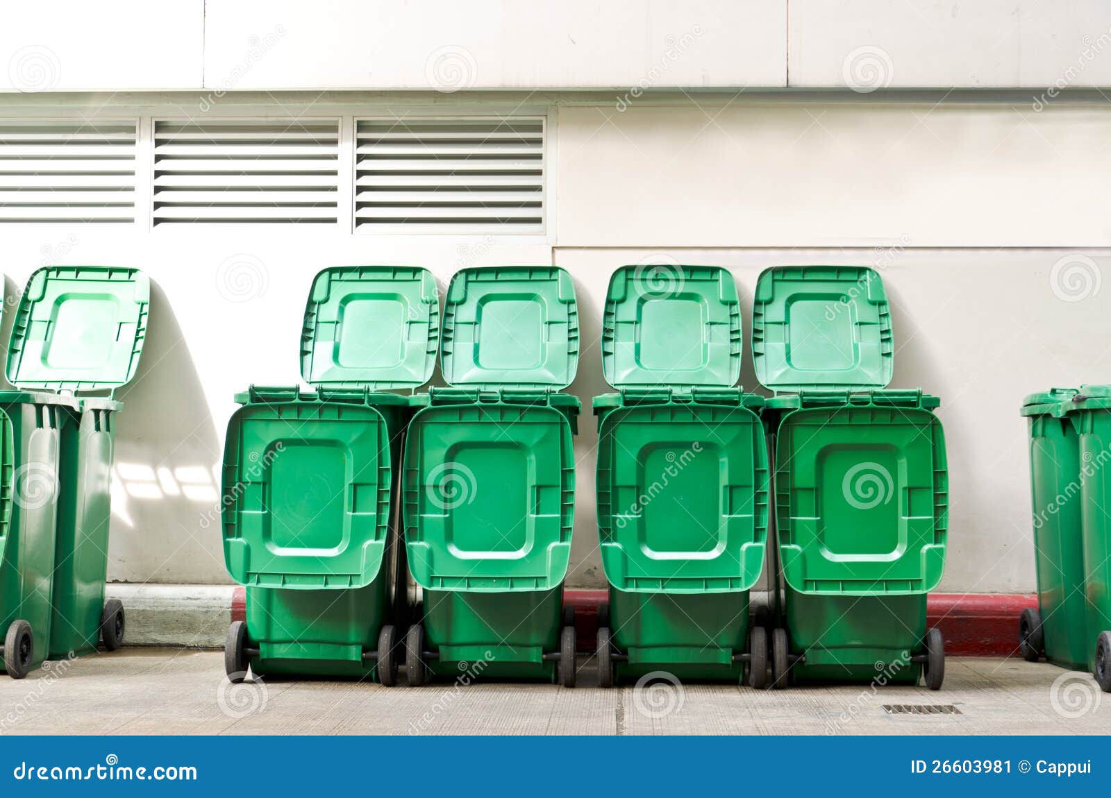 Large green trash cans stock image. Image of container - 26603981