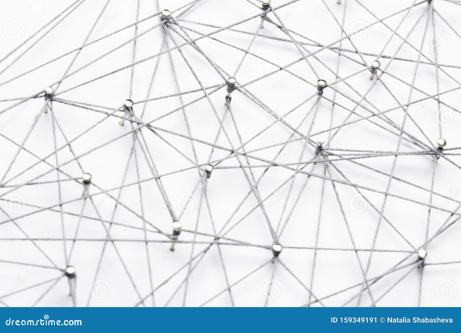 A Large Grid of Pins Connected with String. Communication, Technology ...