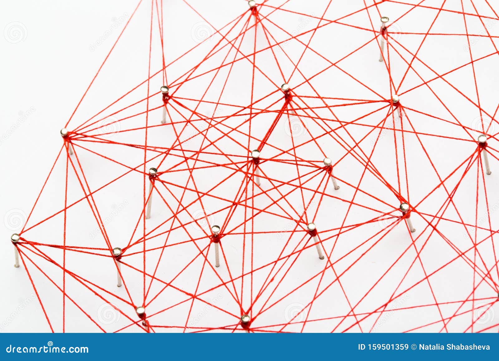 A Large Grid of Pins Connected with String. Communication, Network ...