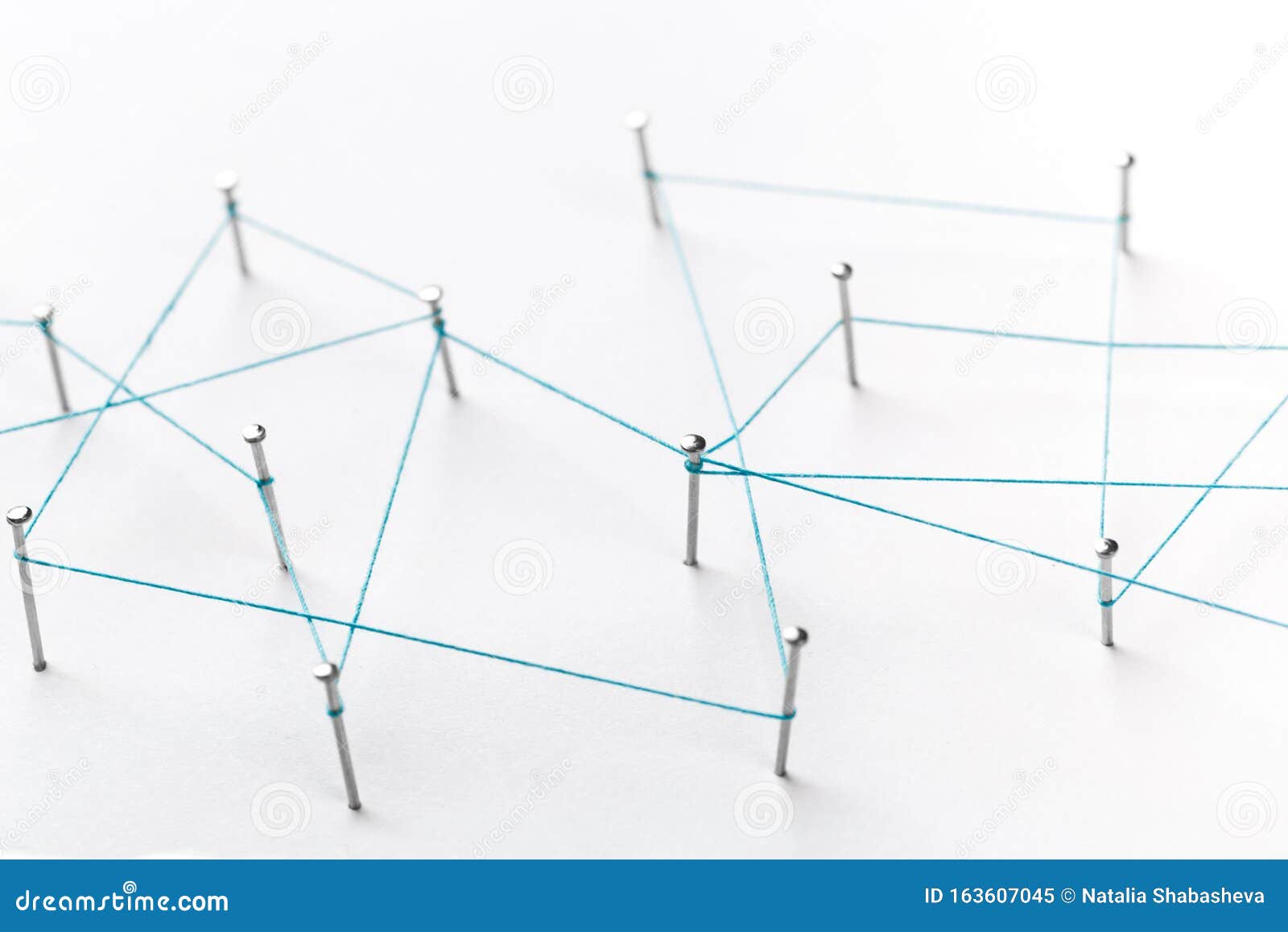 A Large Grid of Pins Connected with String. Communication, Technology ...