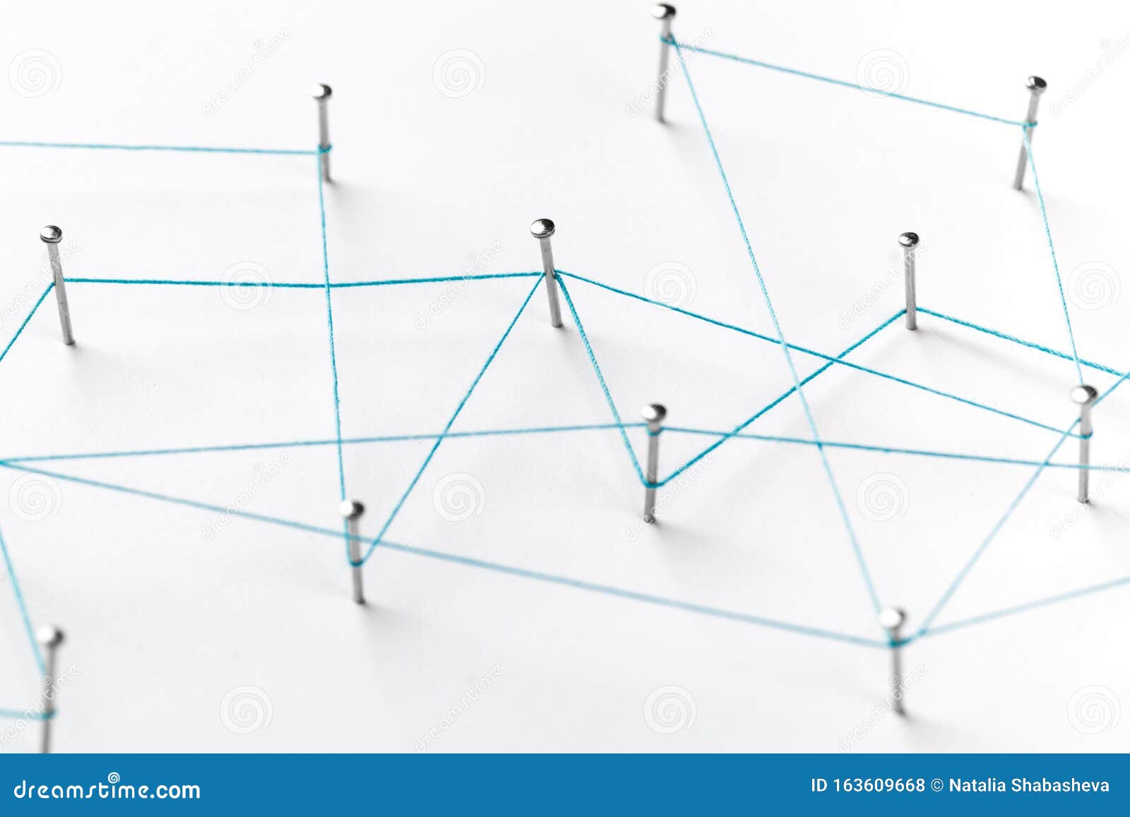 A Large Grid of Pins Connected with String. Communication, Technology ...