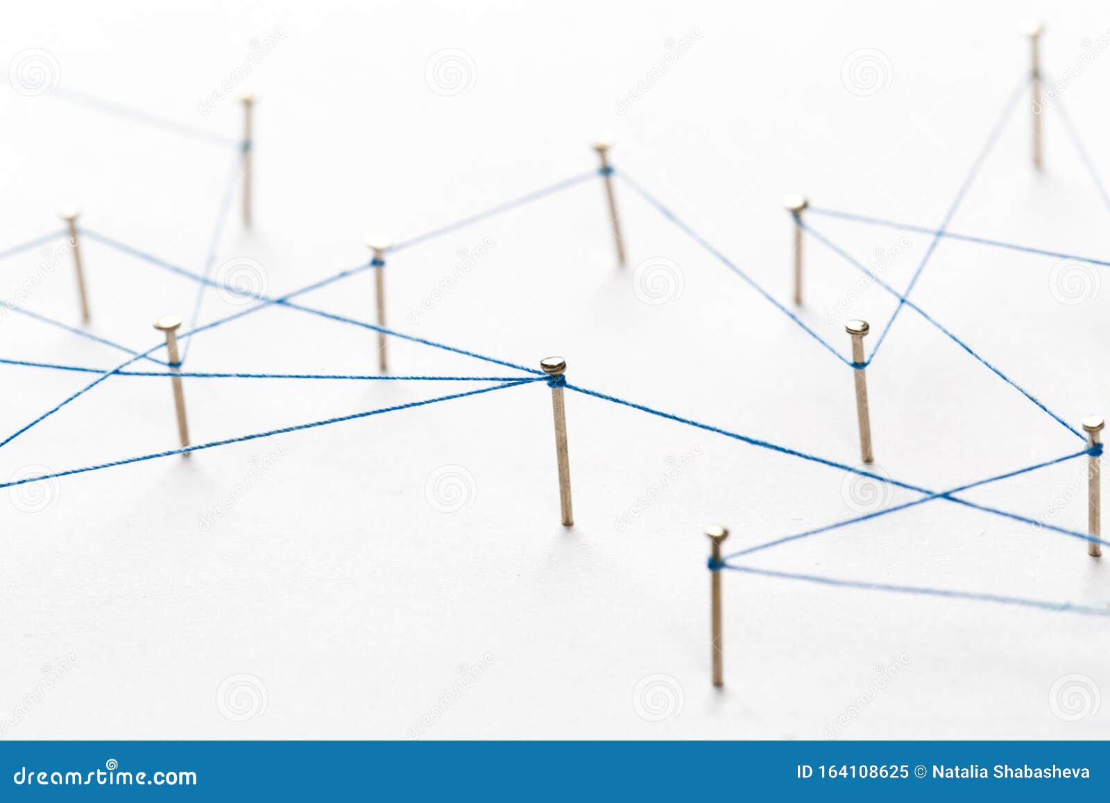 A Large Grid of Pins Connected with String. Communication, Technology ...