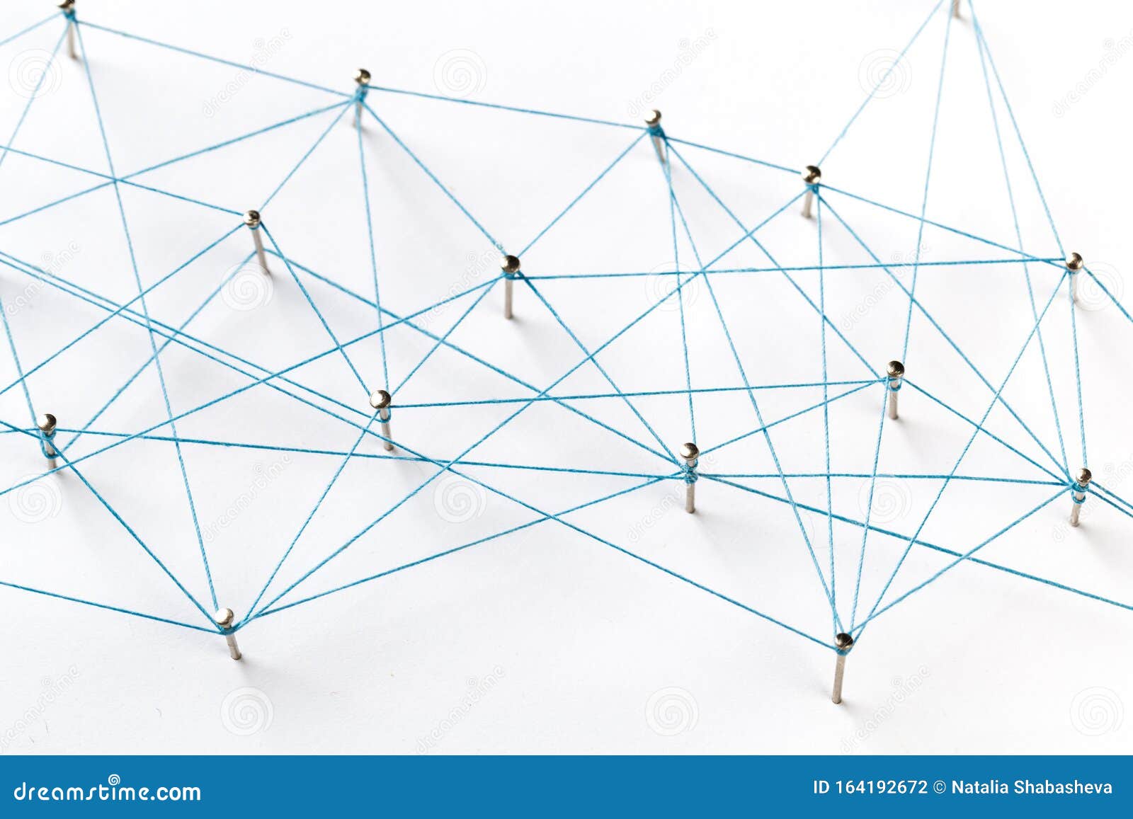 A Large Grid of Pins Connected with String. Communication, Technology ...