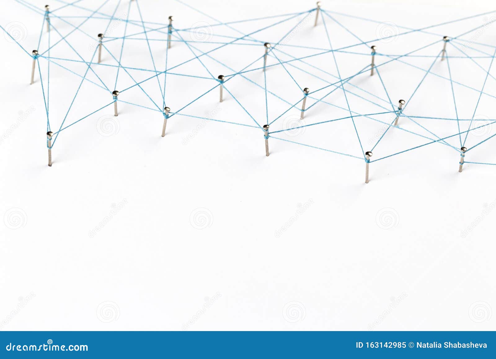 A Large Grid of Pins Connected with String. Communication, Technology ...