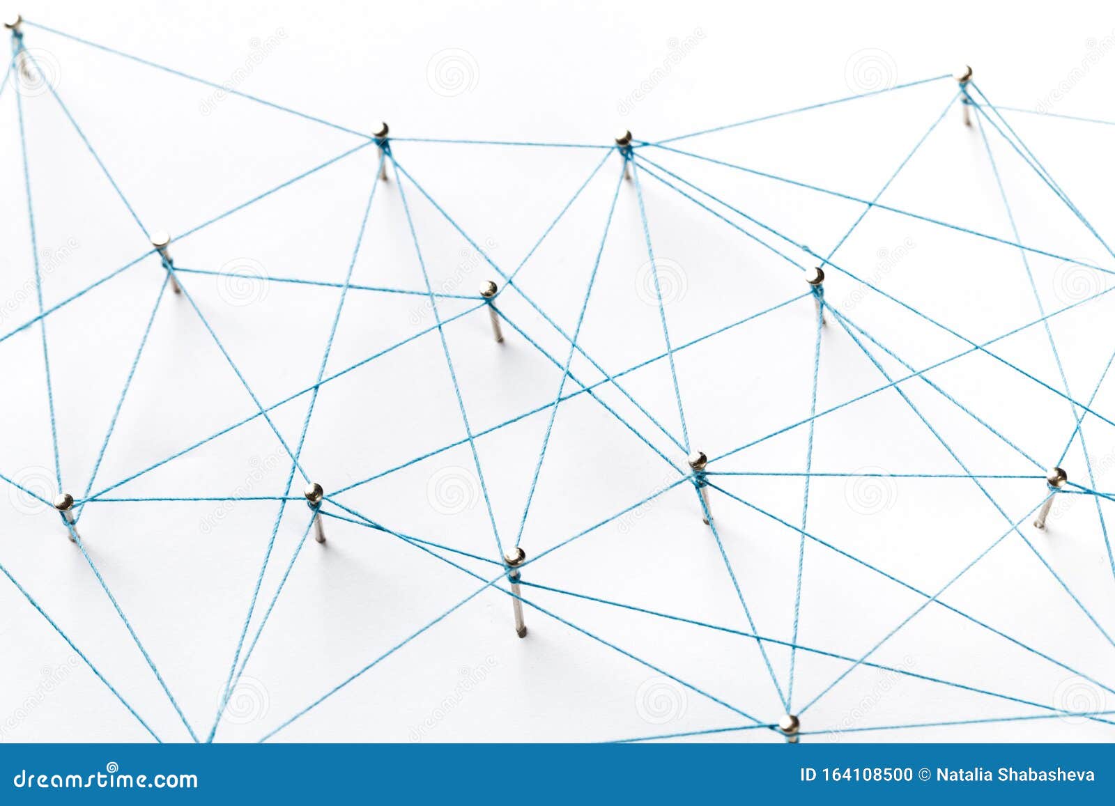 A Large Grid of Pins Connected with String. Communication, Technology ...