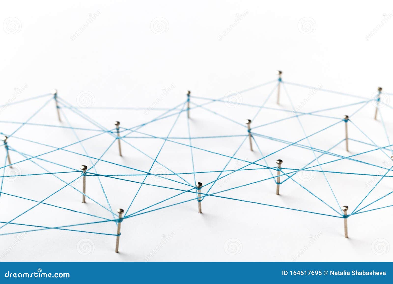 A Large Grid of Pins Connected with String. Communication, Technology ...