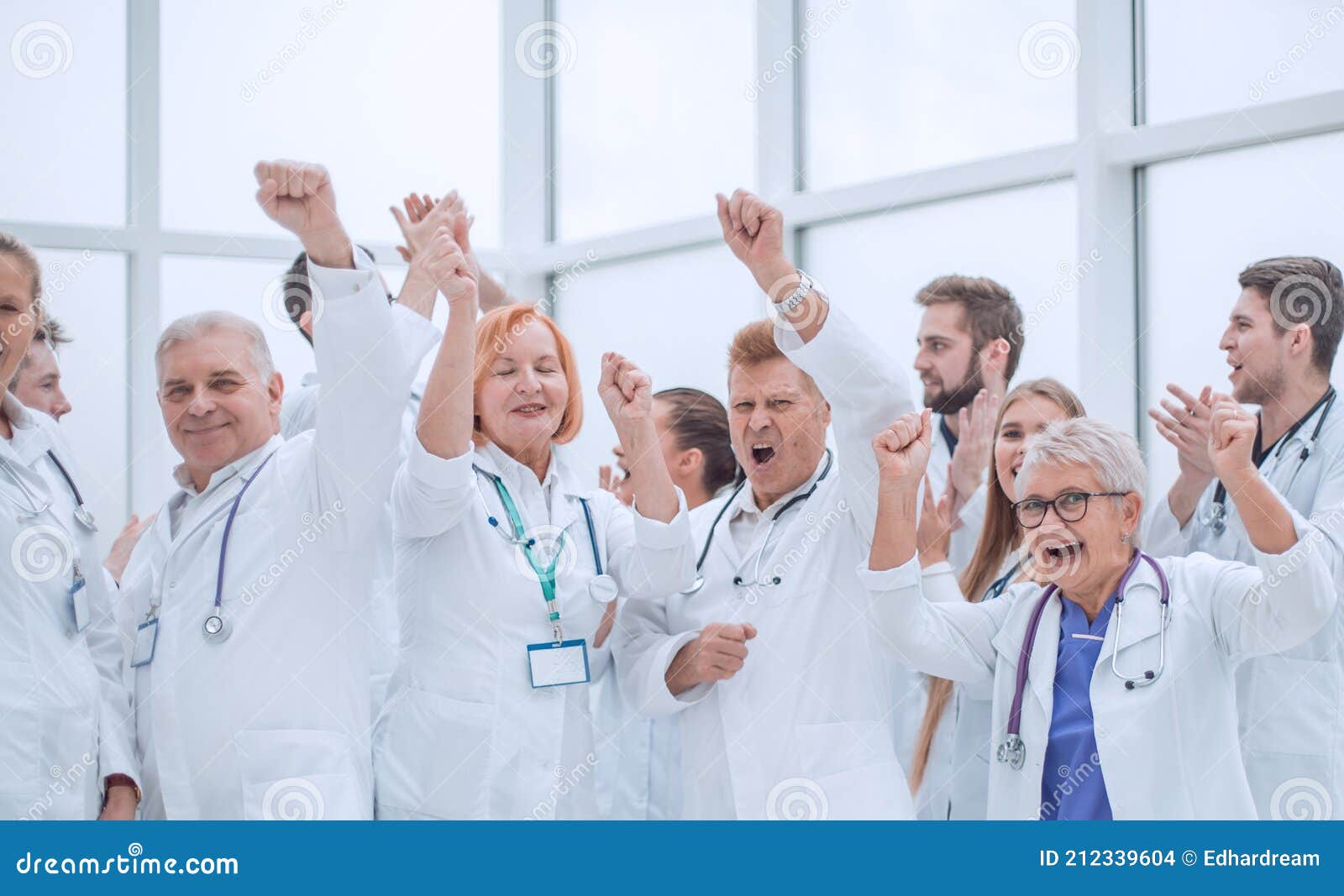 Large Group of Diverse Doctors Celebrating Together. Stock Photo ...