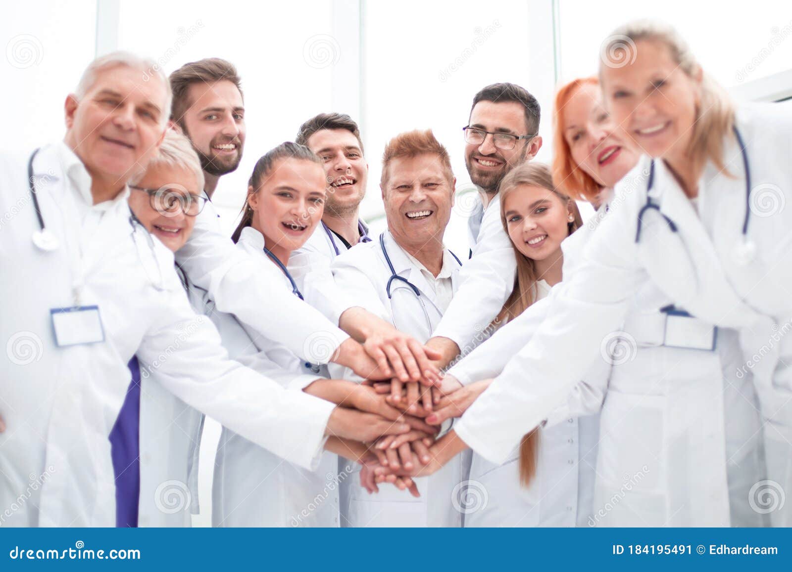 Large Group of Doctors Put Their Hands Together. Stock Image - Image of ...