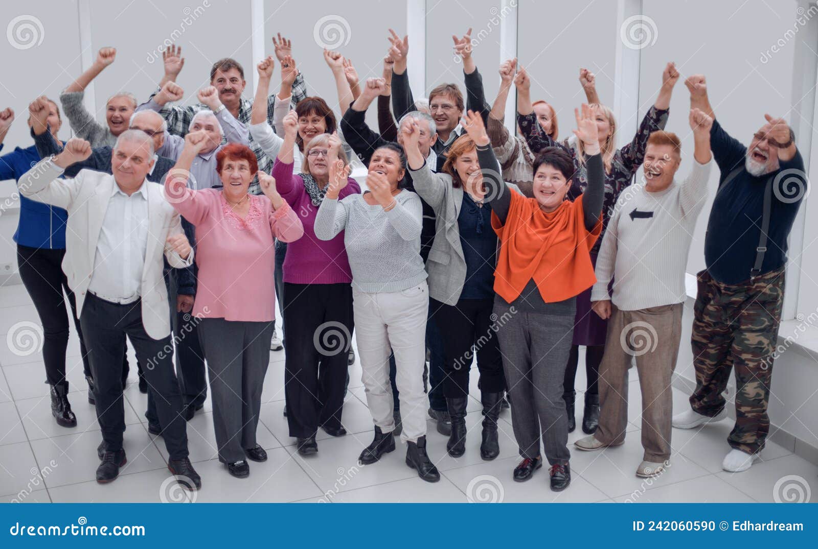 Large Group of Happy People Applauding Thier Team Victory Stock Photo ...