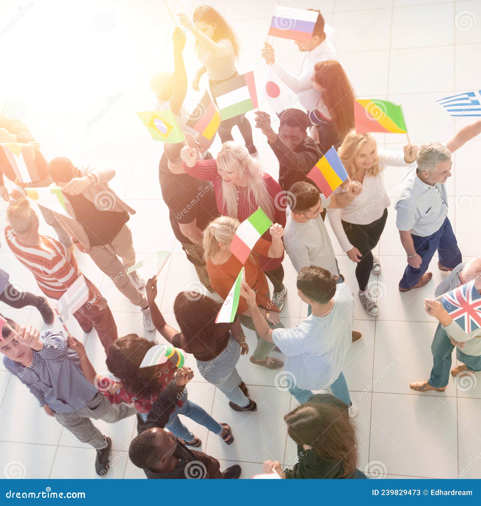 Large Group of People Raising Their National Flags Stock Image - Image ...