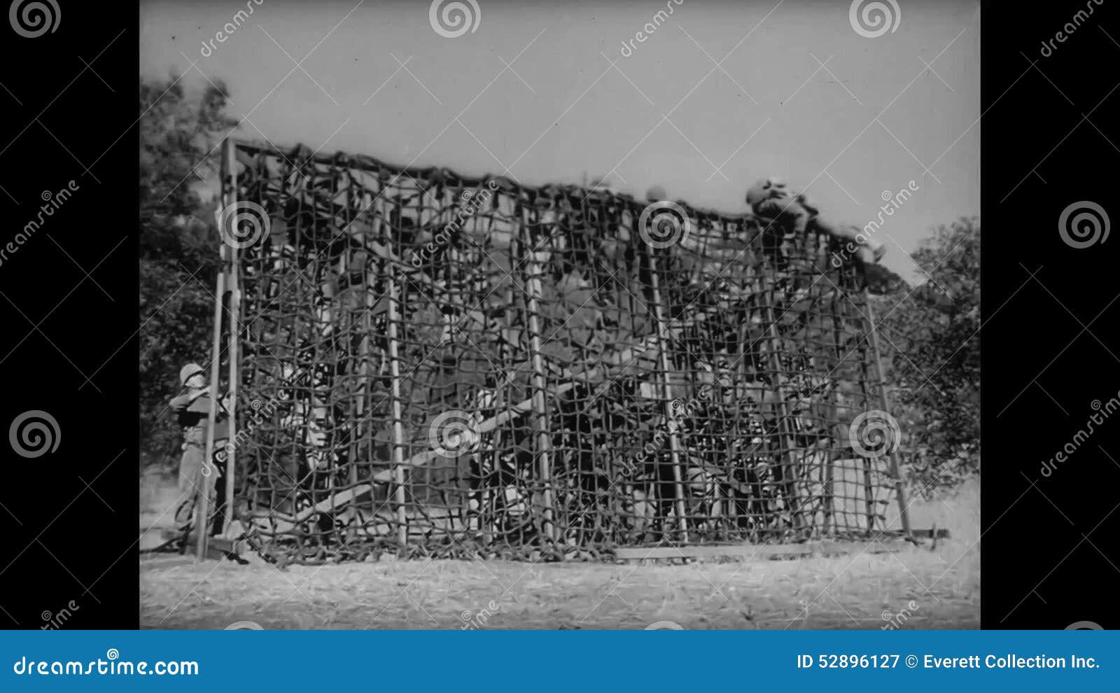 Large Group of Soldiers Scaling Rope Ladder during Training, 1940s ...
