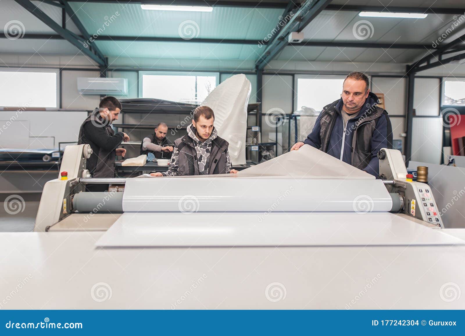 Large Group of Technicians Works in Printing Printshop Press Hall Stock ...