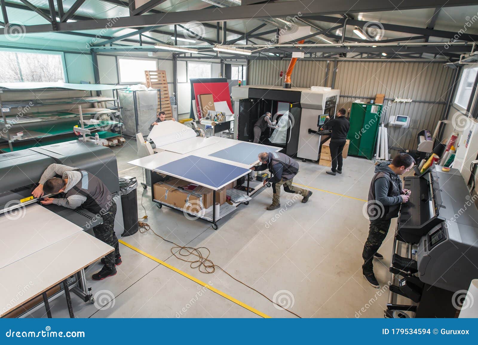 Large Group of Technicians Works in Printing Printshop Press Hall Stock ...