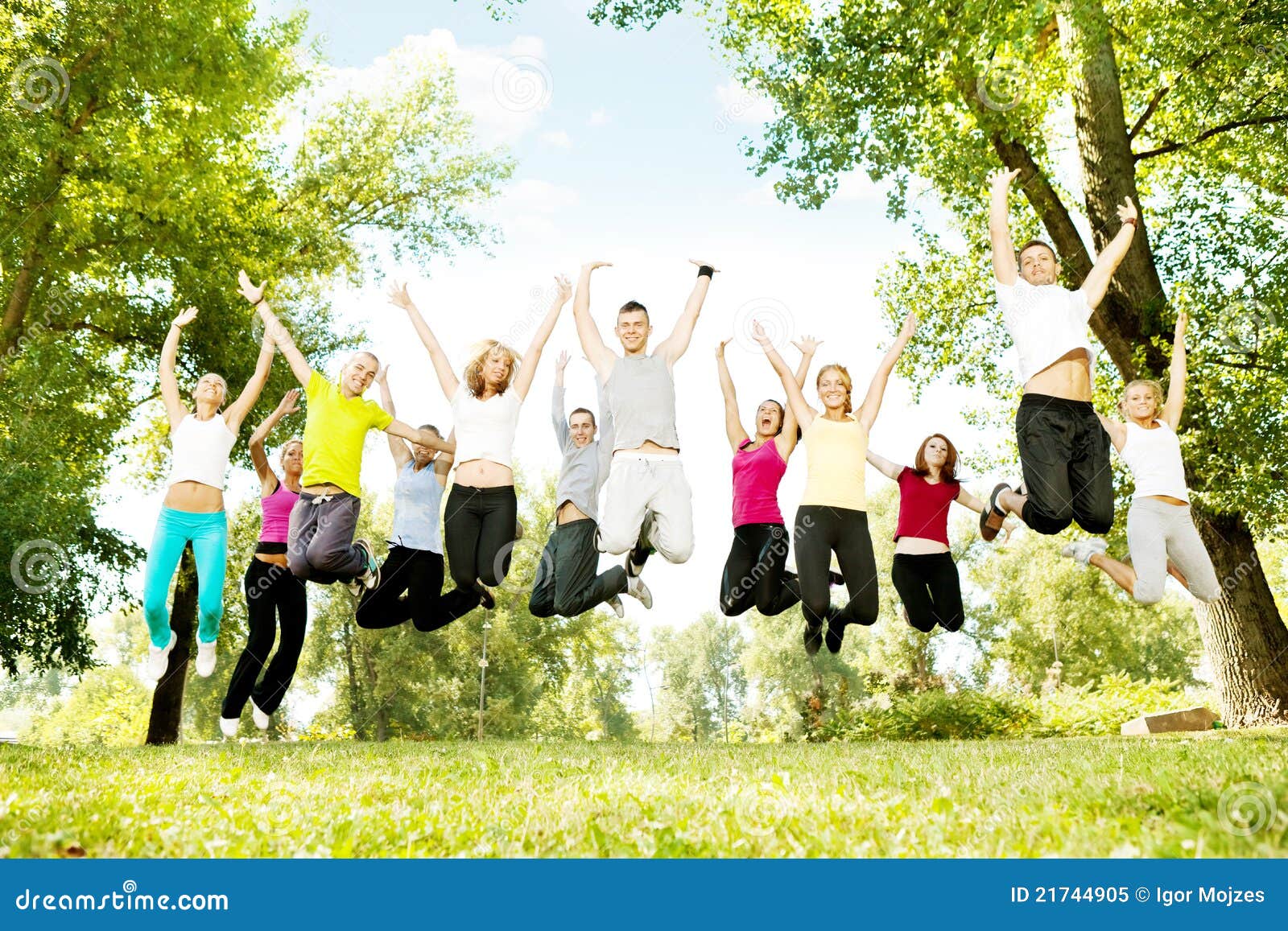Large Group of Teens Jumping Together Stock Image - Image of laughing ...