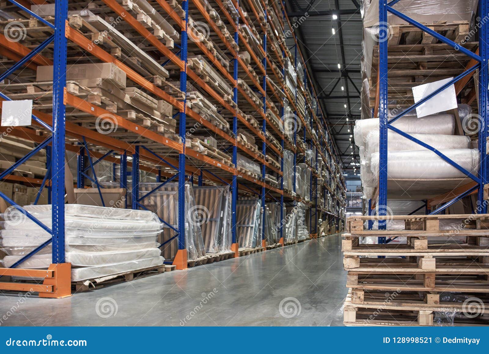 Large Hall of Logistic Warehouse, Many Shelves with Pallets and Goods ...