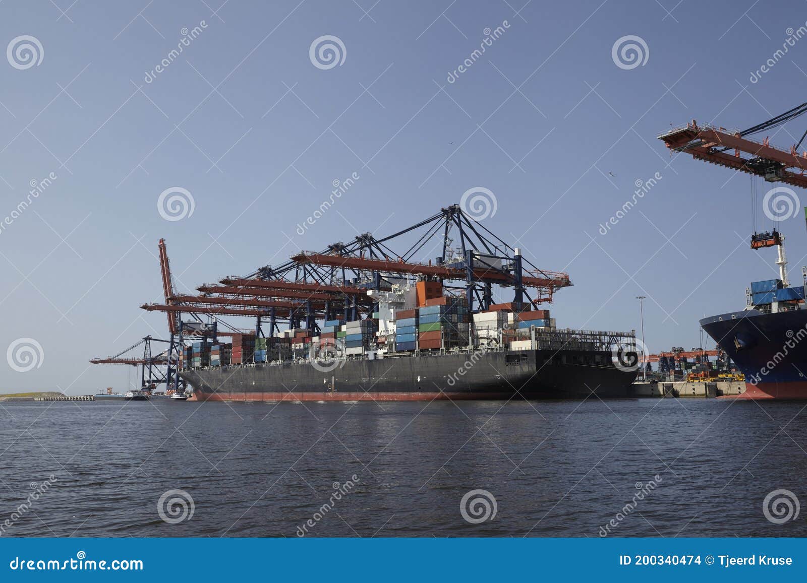 Large Harbor Cranes Loading Container Ships in the Port of Rotterdam ...