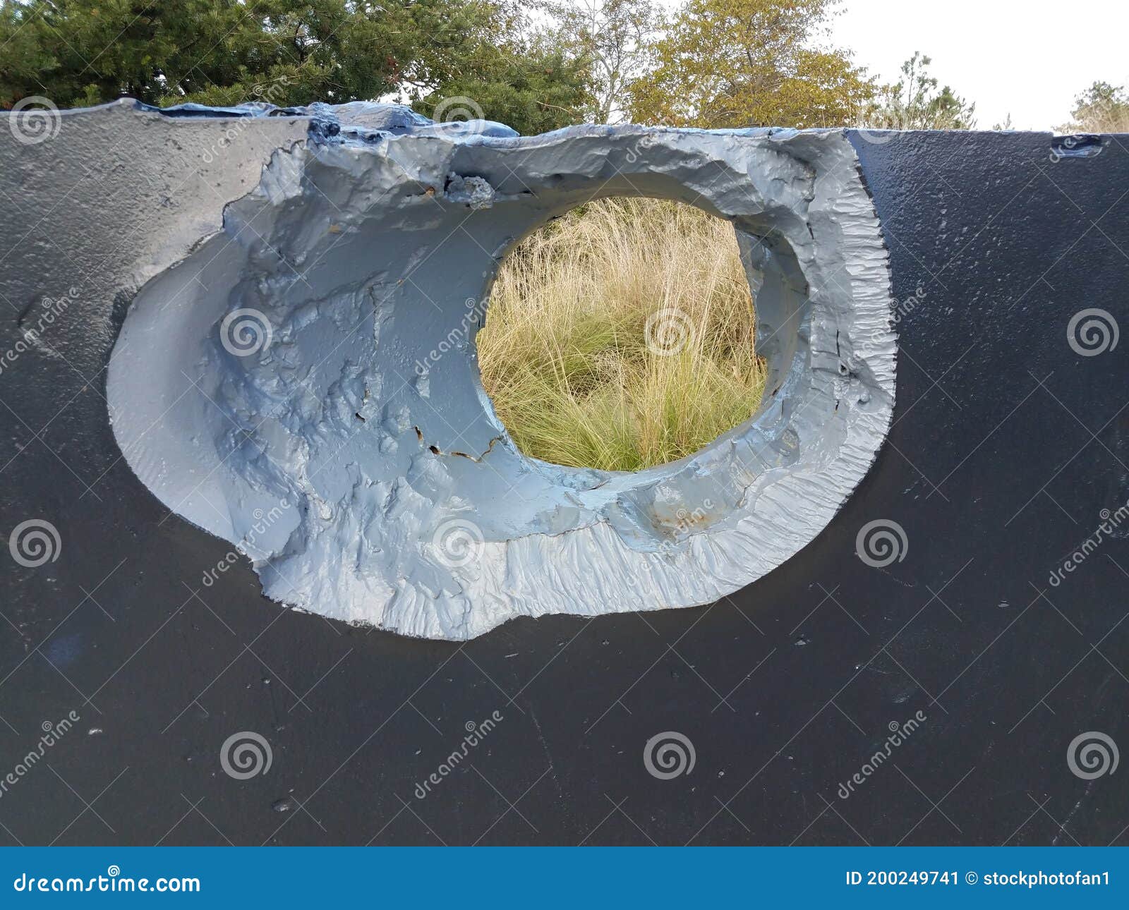 Large Hole or Damage in Metal Wall Outdoor Stock Image - Image of ...