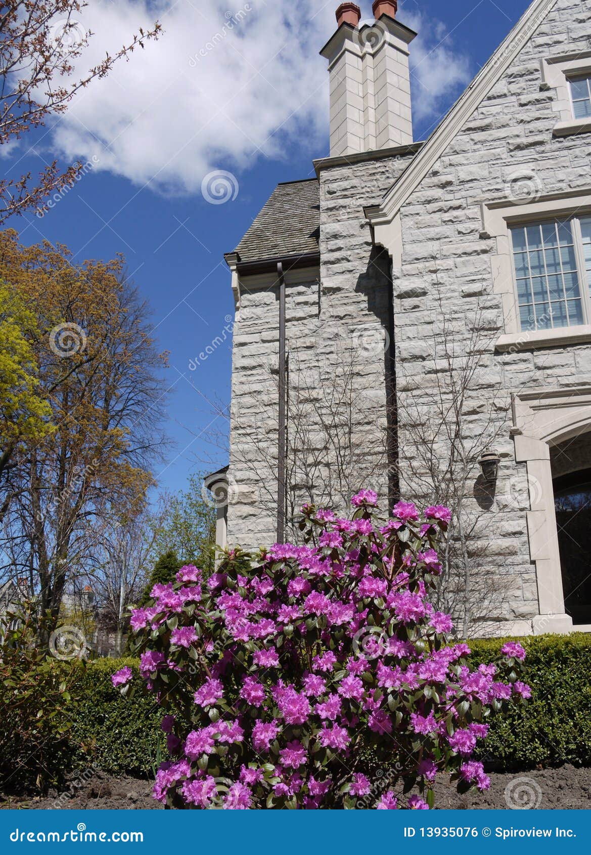 Large House with Spring Flowers Stock Photo - Image of storey, bush ...