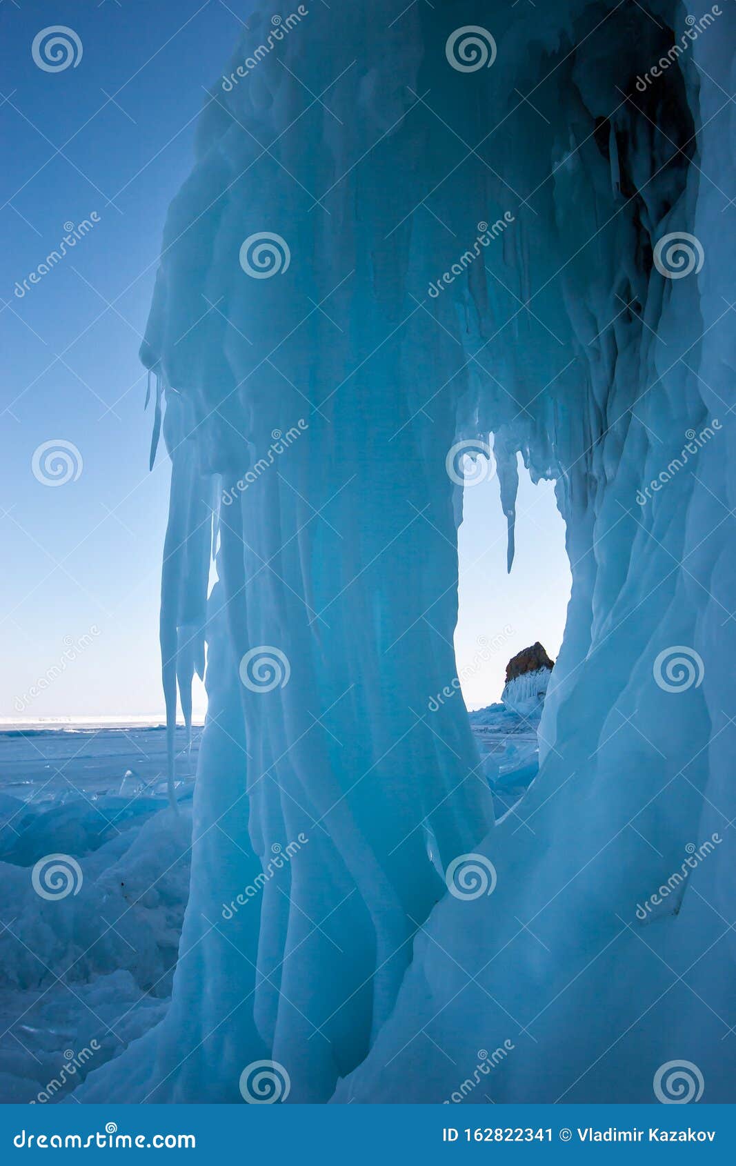 A Large Ice Formation from Icicles Hanging from a Cliff. Stock Image ...