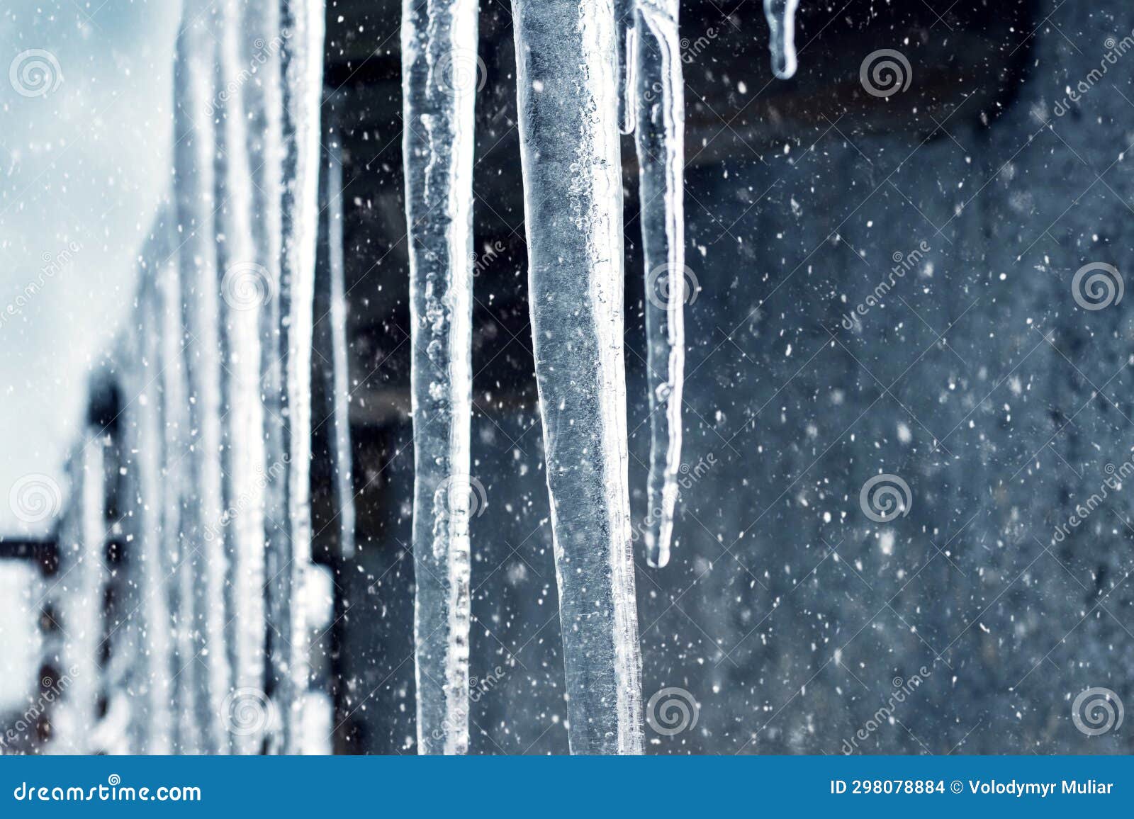 Large Icicles Hang from the Roof during Snowfall Stock Photo - Image of ...