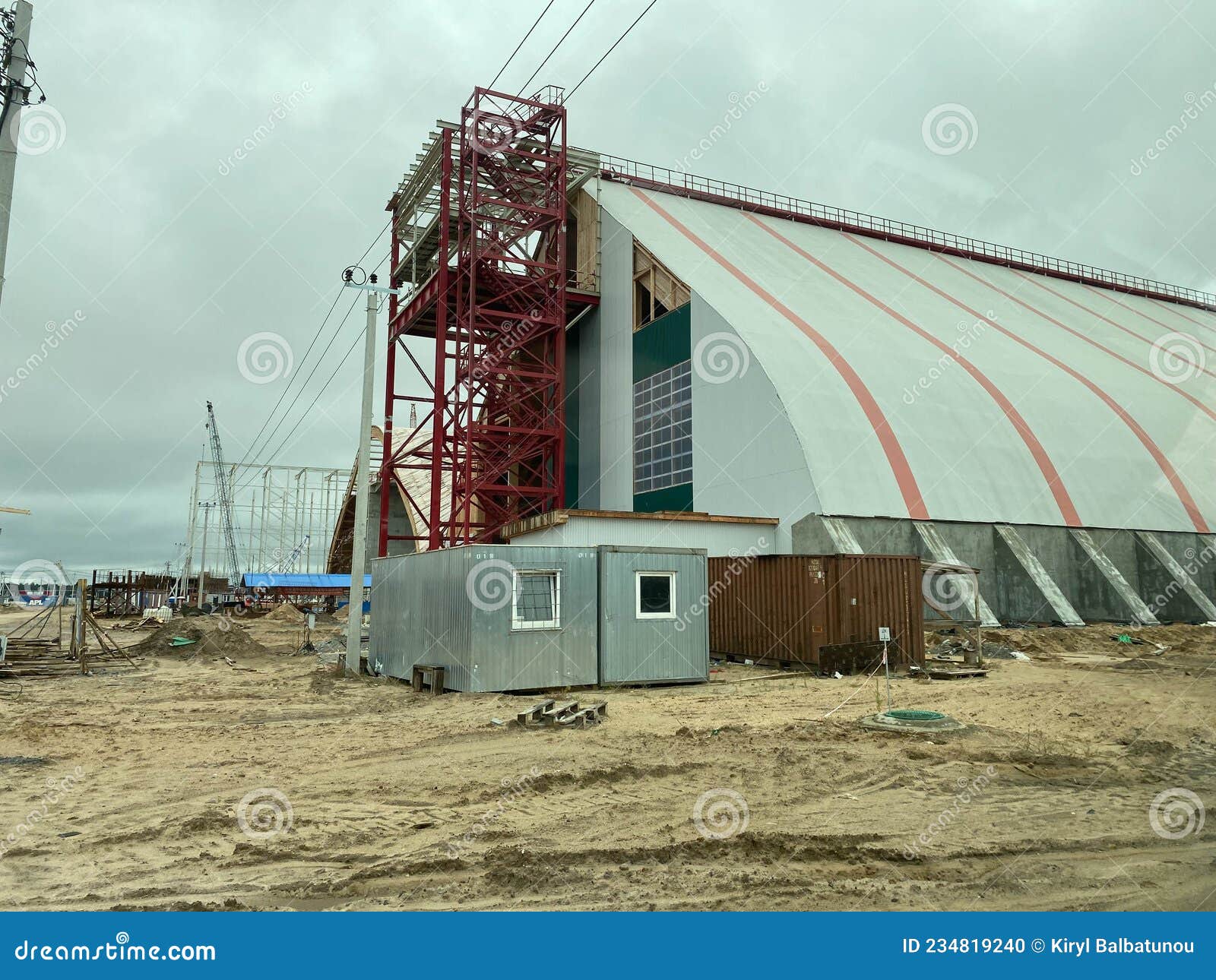 A Large Industrial Barn Warehouse and Modular Buildings for Workers at ...