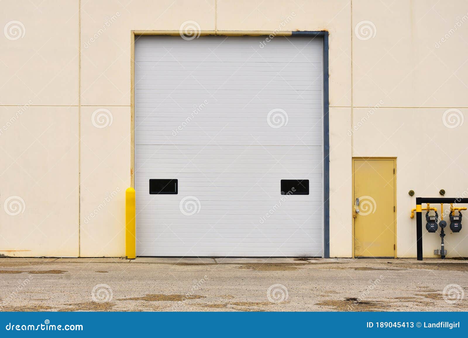 Large Industrial Bay Doors stock image. Image of load - 189045413