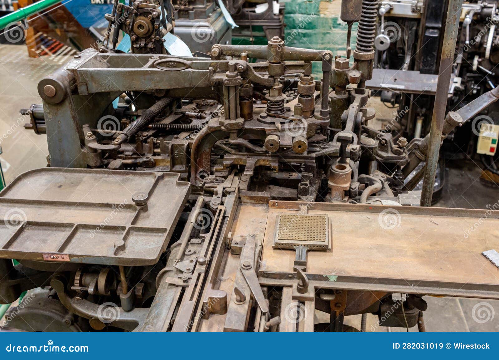 A Very Large Machine in a Building that Has Lots of Tools on it Stock ...