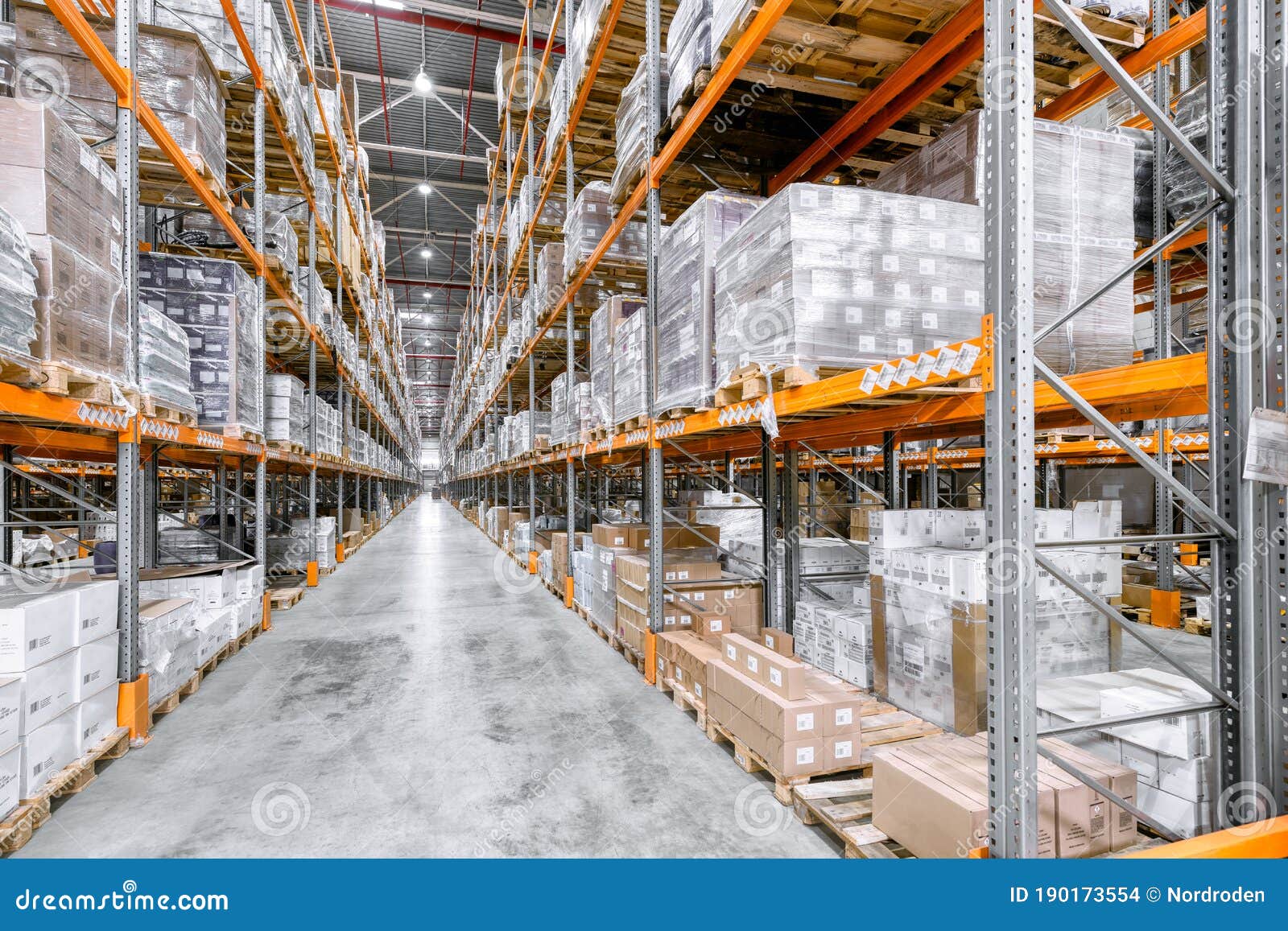 Large Industrial Warehouse. Tall Racks are Completely Filled with Boxes ...