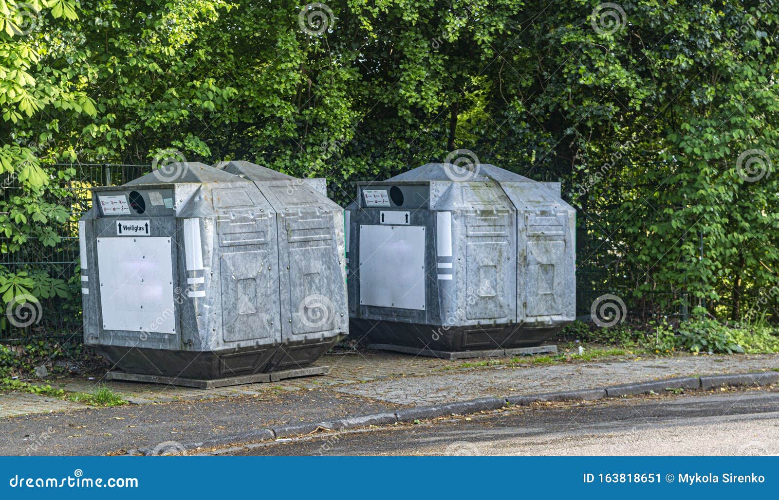 Large Iron Industrial Trash Can. A Mess With Garbage With Dirt, Poor ...