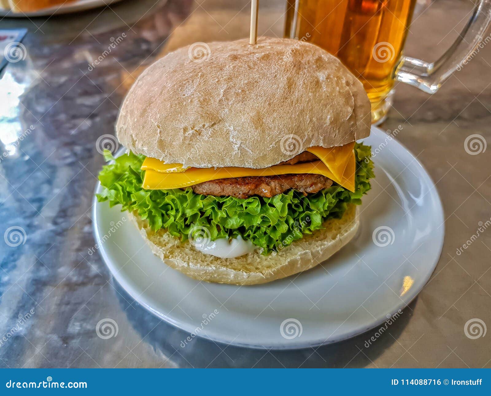 Large juicy cheeseburger stock photo. Image of background - 114088716