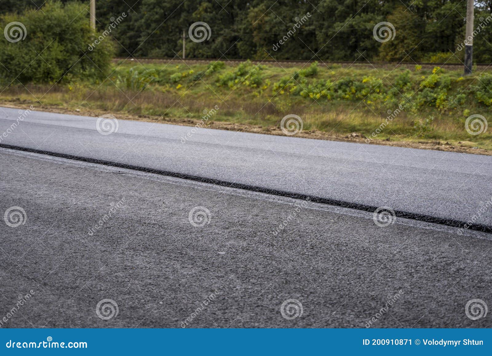 A Large Layer of Fresh Hot Asphalt. Layer of Asphalt Raw Material in a ...