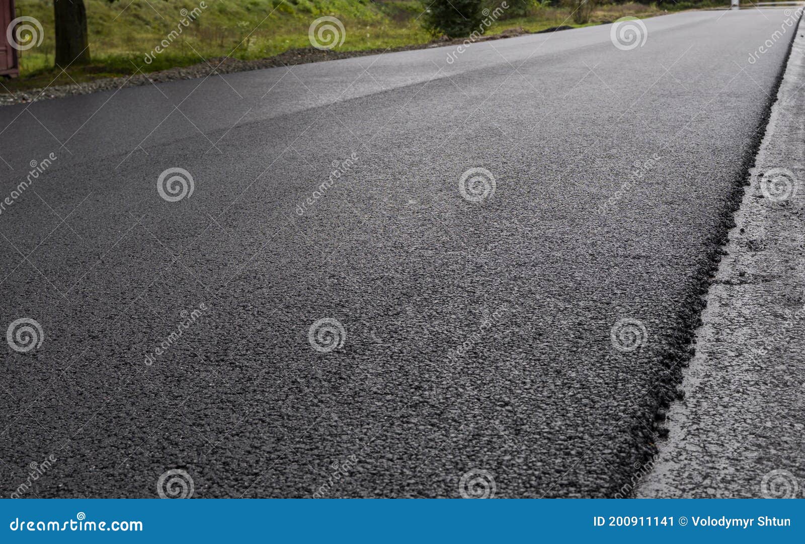A Large Layer of Fresh Hot Asphalt. Layer of Asphalt Raw Material in a ...