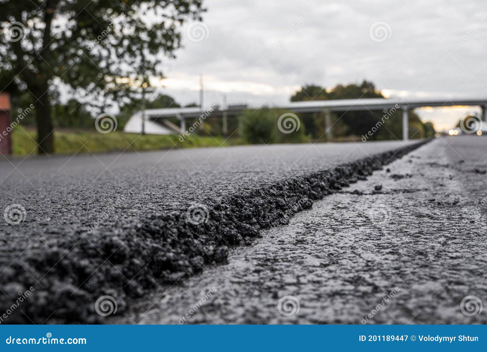A Large Layer of Fresh Hot Asphalt. Layer of Asphalt Raw Material in a ...