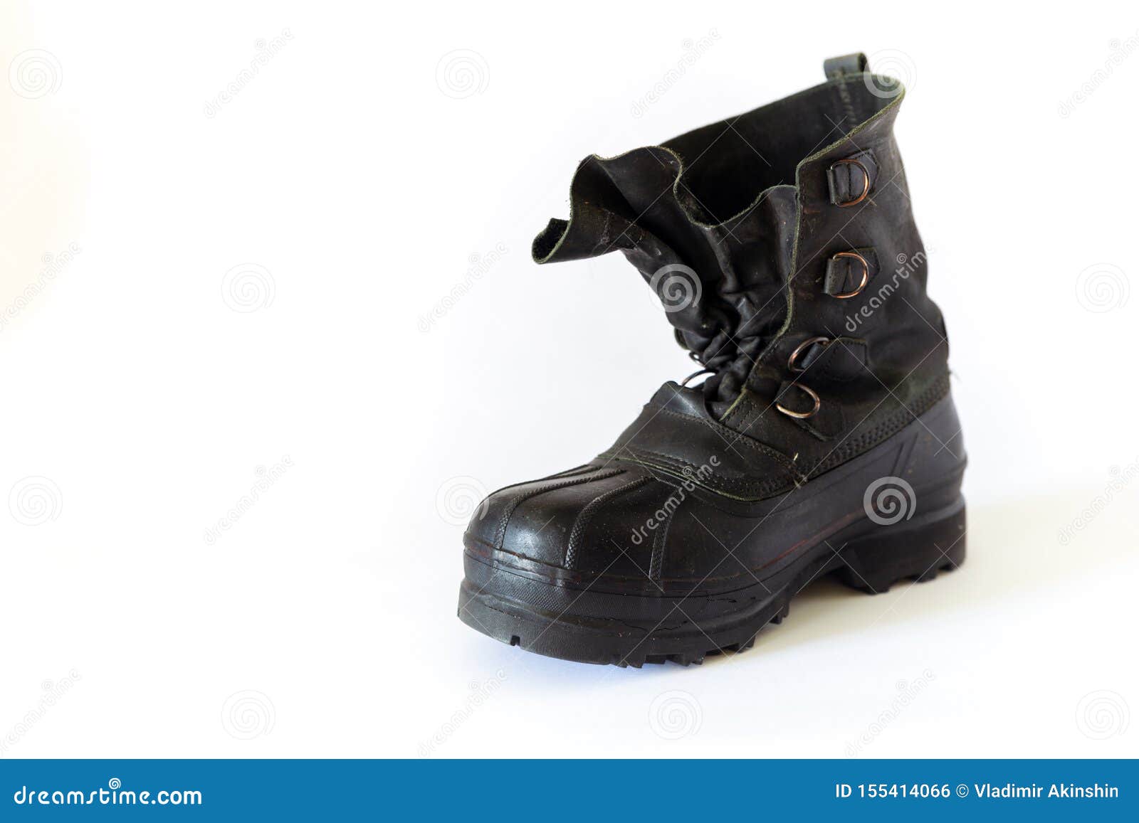A Large Leather Boot Torn from Time To Time on Stock Photo - Image of ...