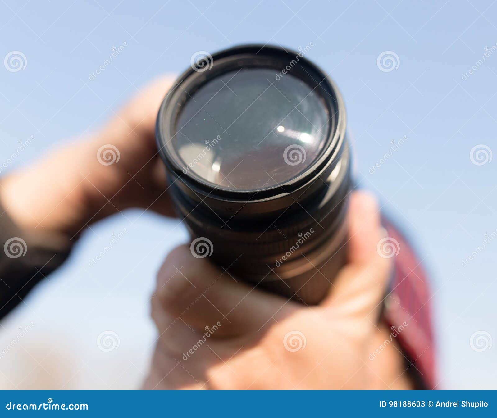 A Large Lens in the Camera of a Man Stock Image - Image of looking ...