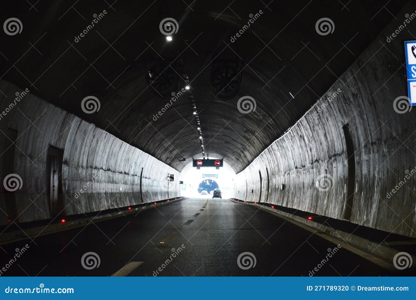 Large Lighted Tunnel and Road Stock Photo - Image of darkness, symmetry ...