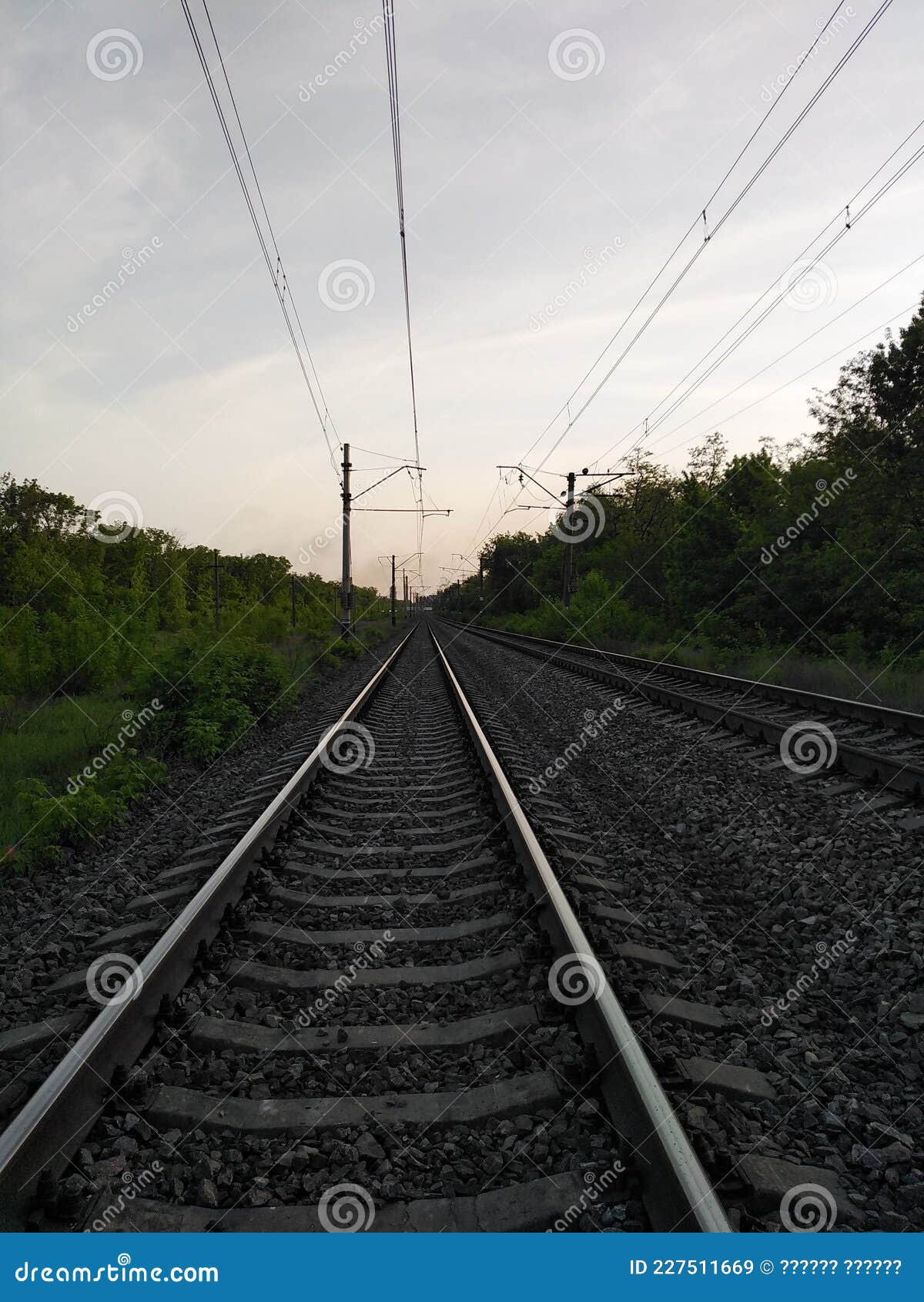 A Large Long Train on a Railroad Track Stock Image - Image of stop ...